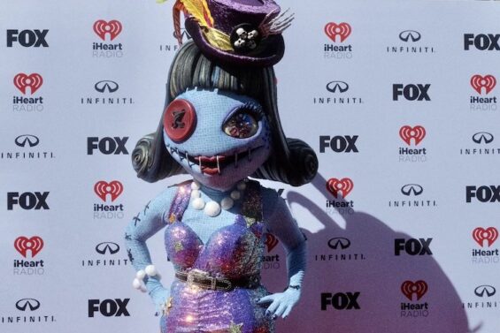 'The Masked Singer' Contestant Doll Walks iHeartRadio Awards Red Carpet